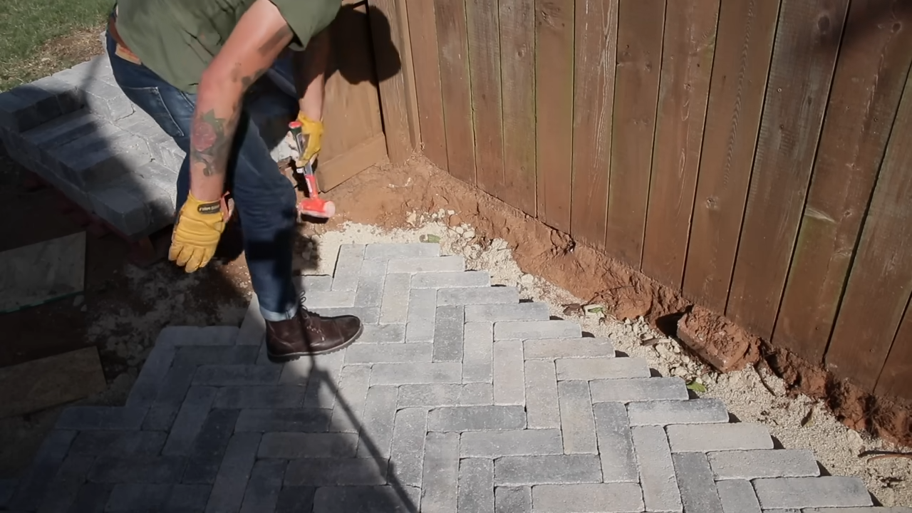 “It feels like a new backyard” patio makeover with herringbone pavers