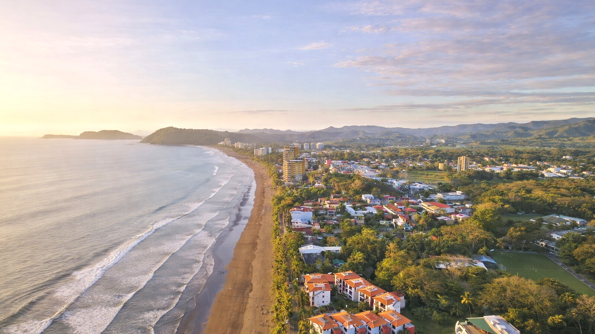 Waves rolling along the morning shore