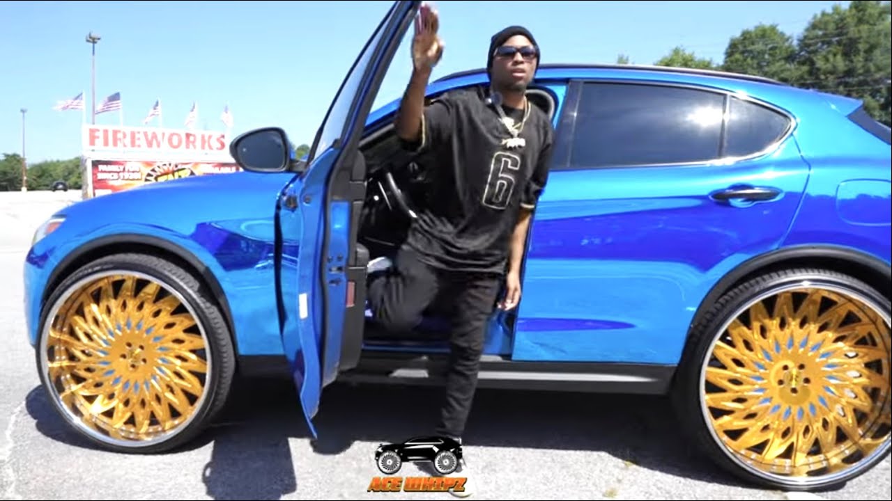 First in the world chrome blue Alfa Romeo Stelvio on gold 30" Rucci forged