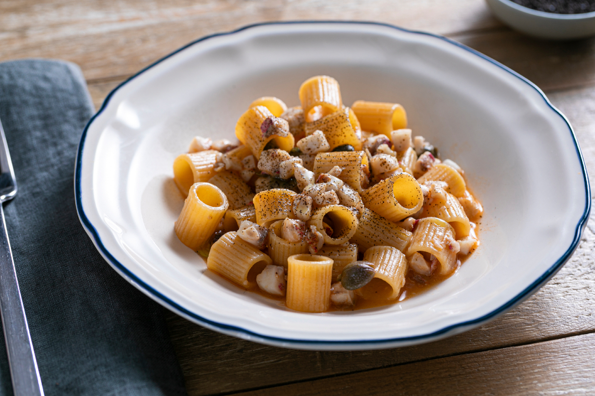 Pasta with red mullet, capers, and black garlic