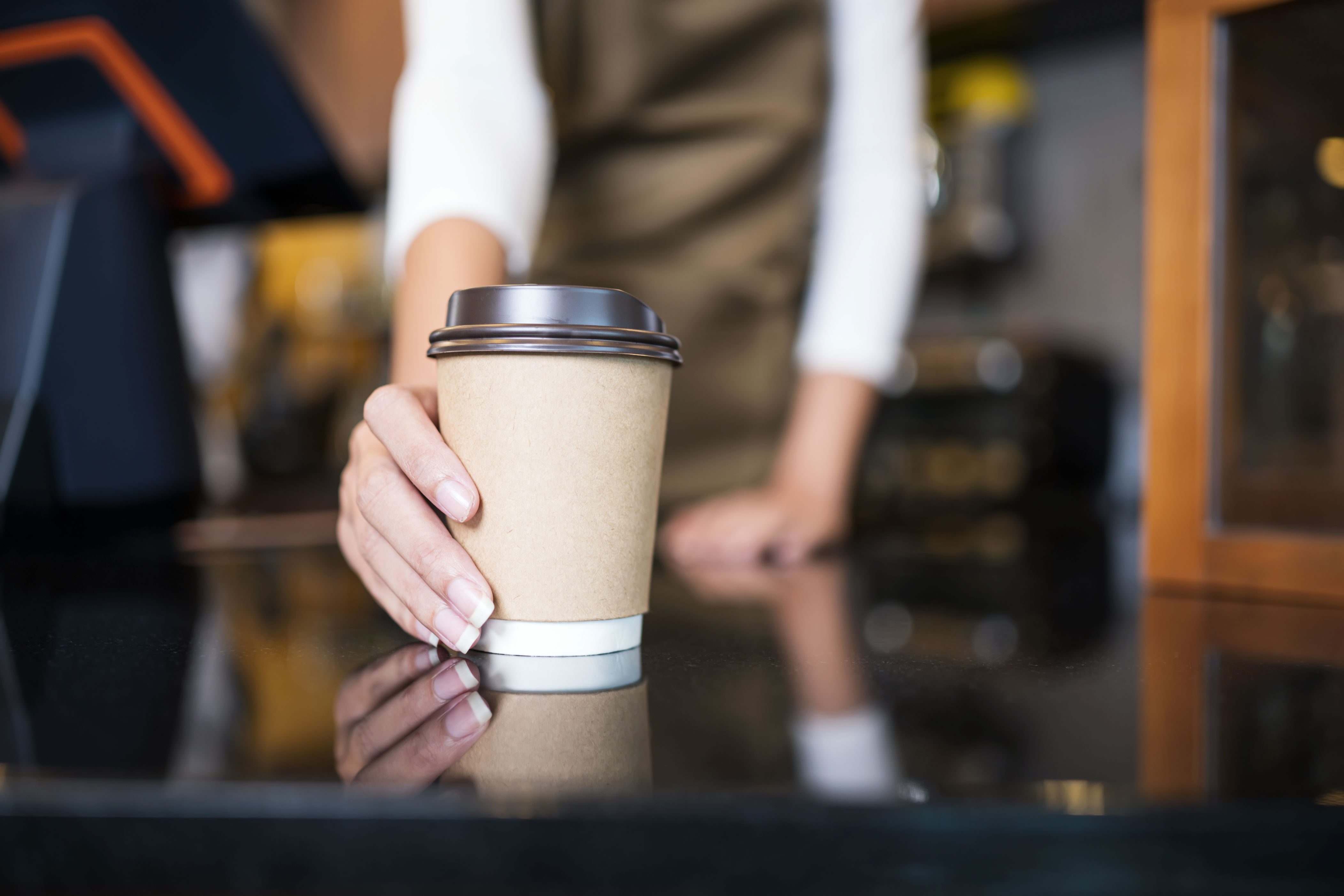 The hidden plastic inside your coffee cup matters more than you think