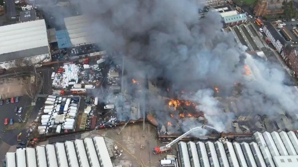 Road near site of huge factory fire remains closed