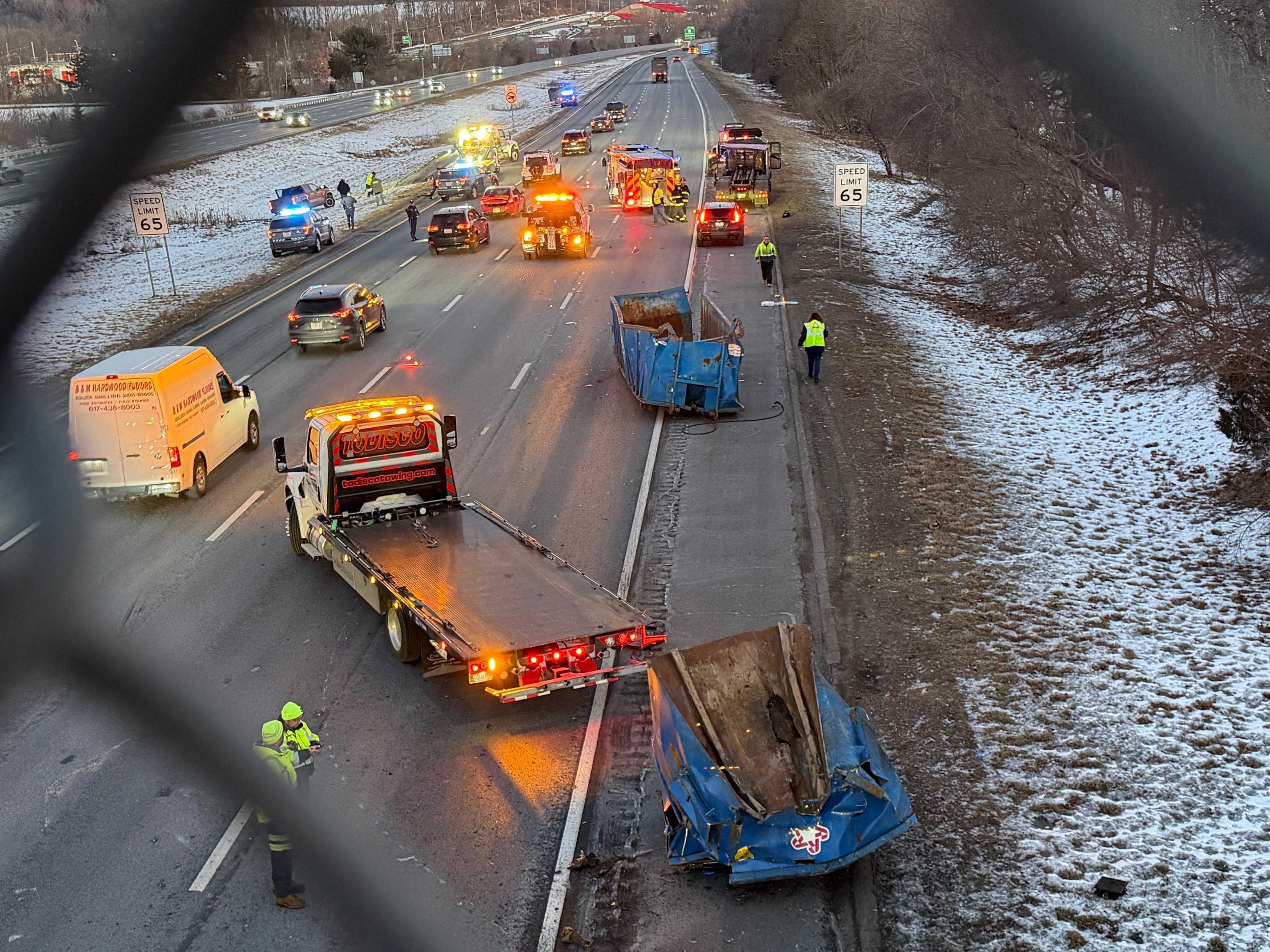 Dumpsters fall off truck, snarl traffic on Interstate 95