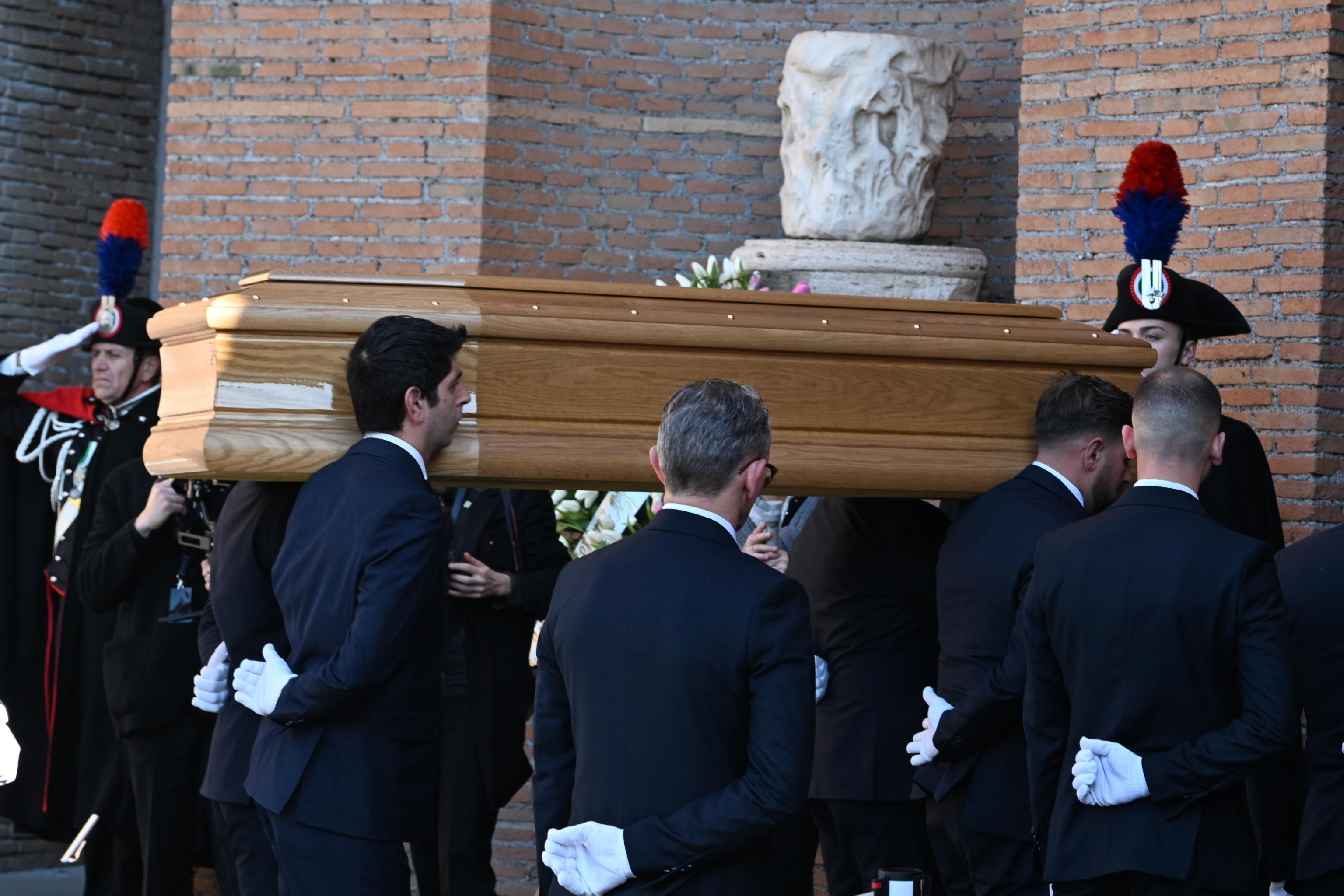 Hathaway, Hurley present as Italy bids final farewell to Valentino