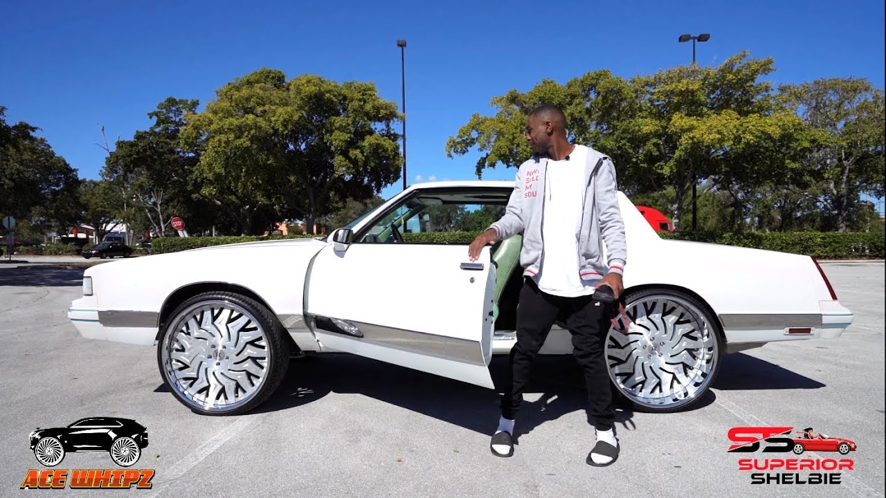 Pearl white 87 Chevy Monte Carlo LS on brushed 26" Rucci Forged