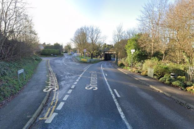 Two people rescued from roof of flooded car in Kent