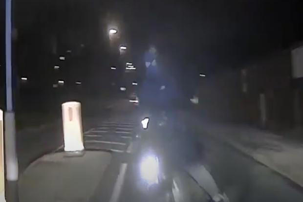 Watch moment police bring chase to halt by knocking masked burglar off ...