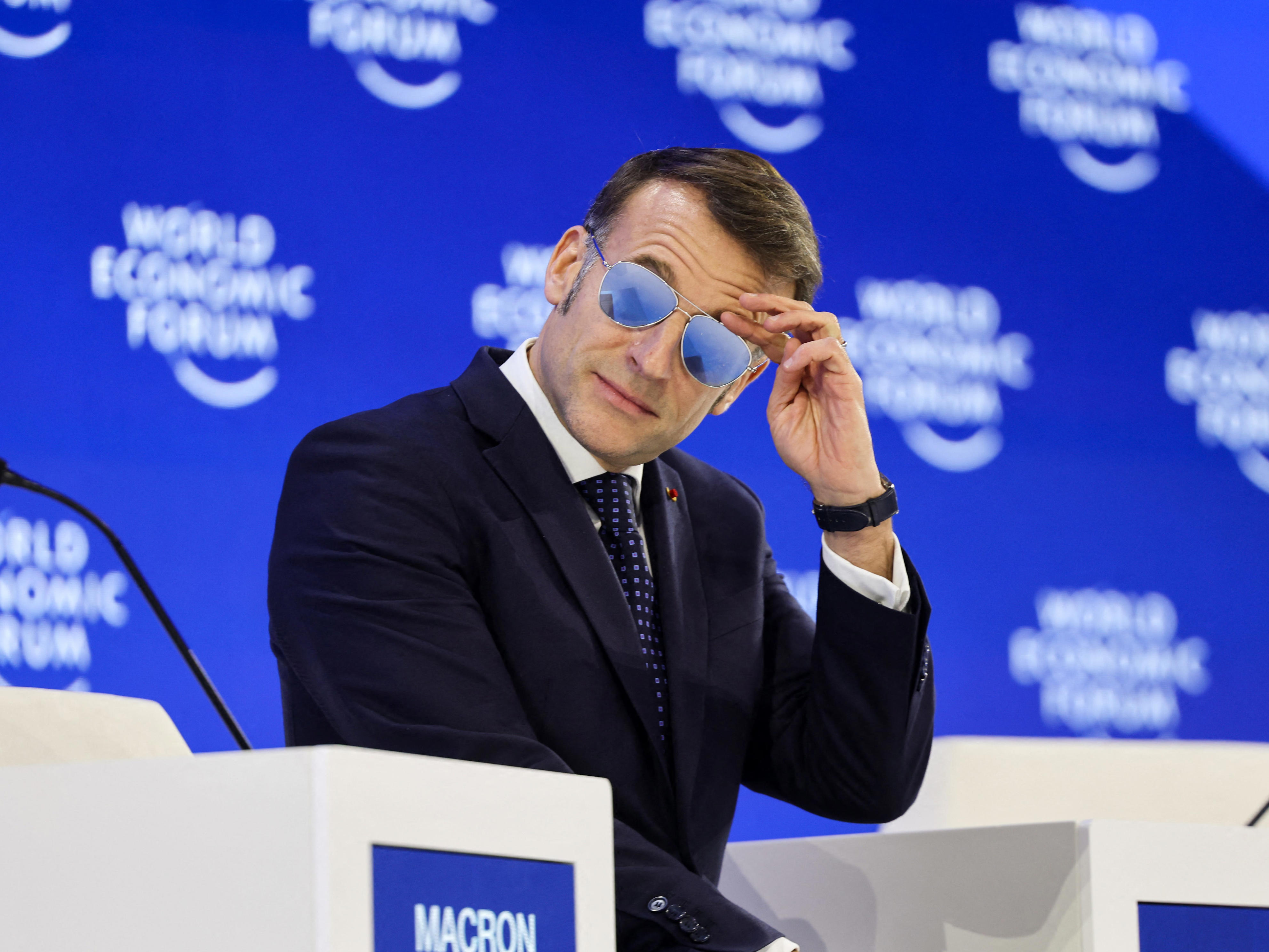 Macron's shades at Davos sent shares of a tiny Italian sunglasses ...
