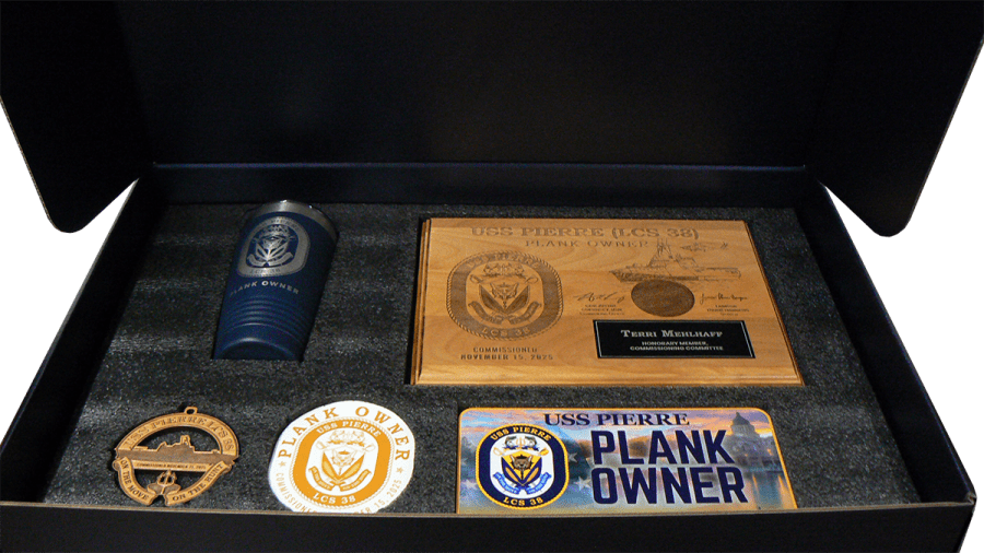 Inmates make gift boxes presented to USS Pierre