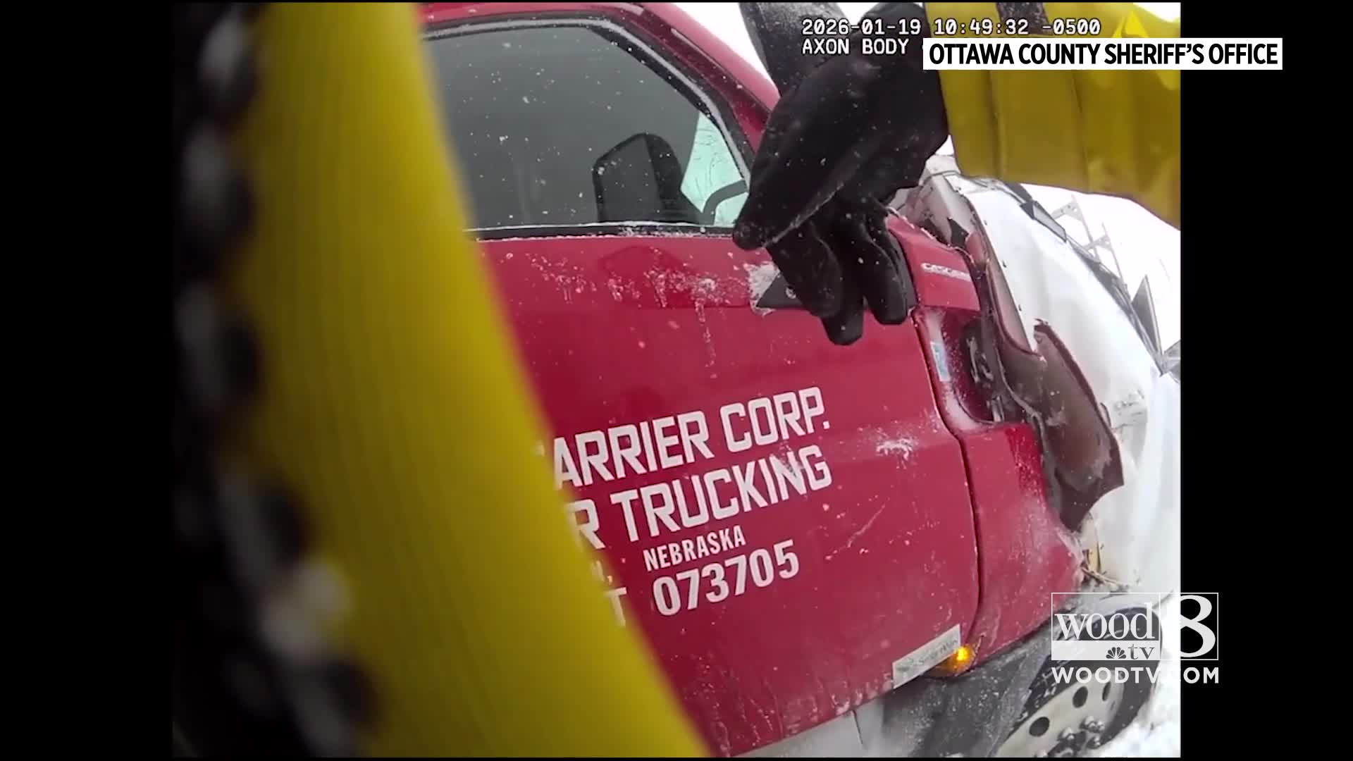 Cars, trucks slide off I-196 during pileup in dashcam and bodycam video