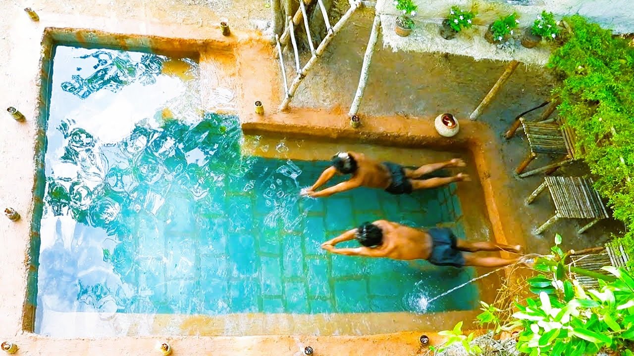 Primitive two-story hut & swimming pool built by hand | Wilderness ...