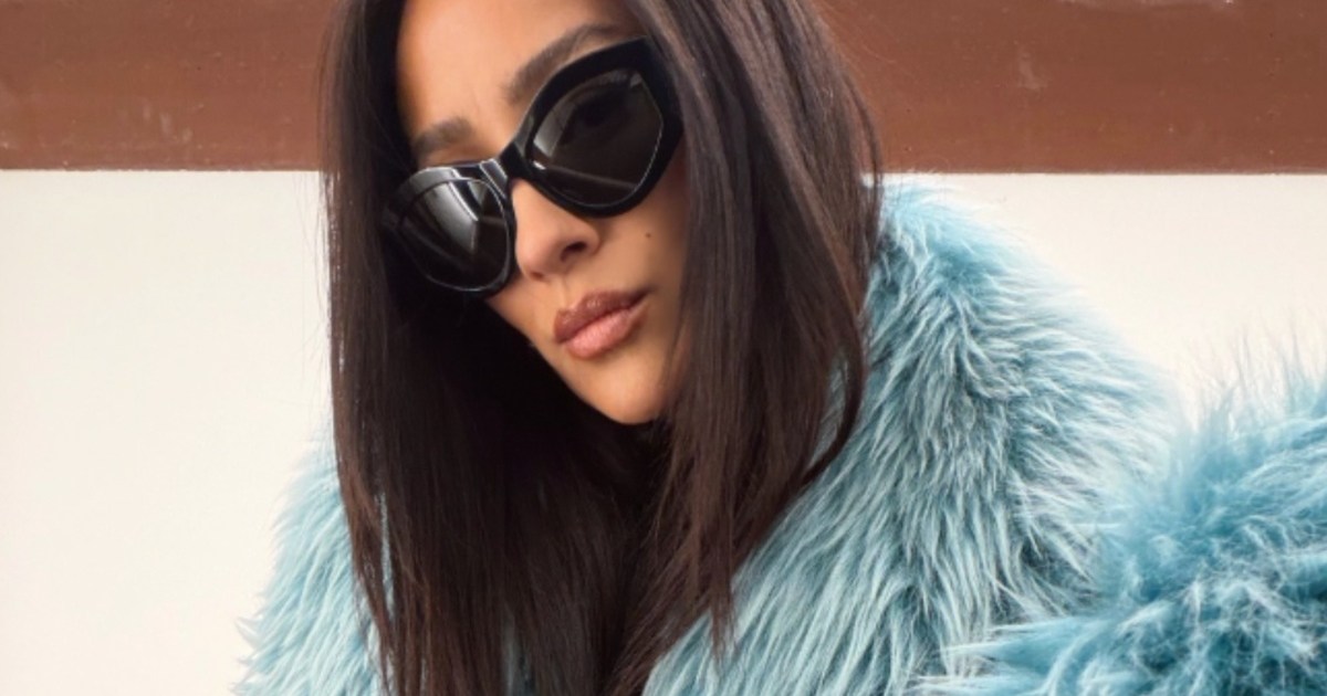 Shay Mitchell does preppy chic right in tiny micro skirt & Nike T-shirt