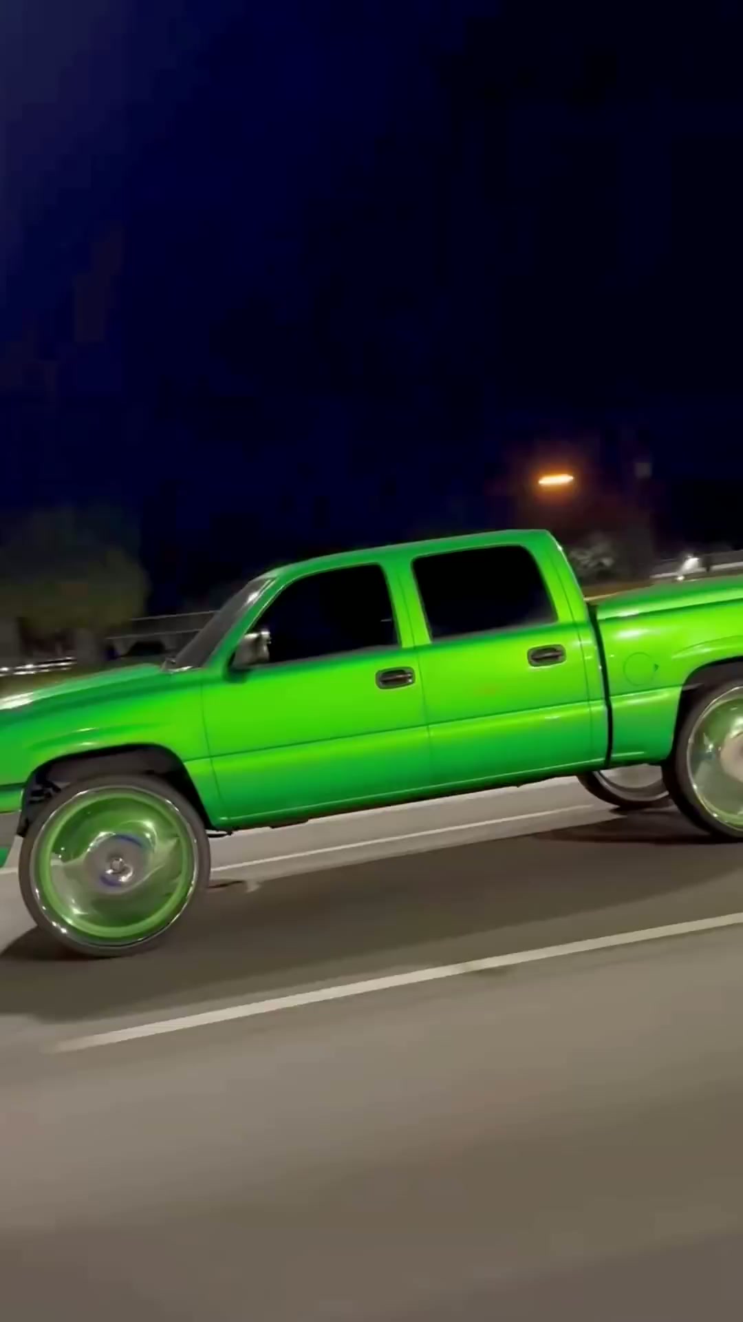 Candy green Chevy Silverado on 32’s skating