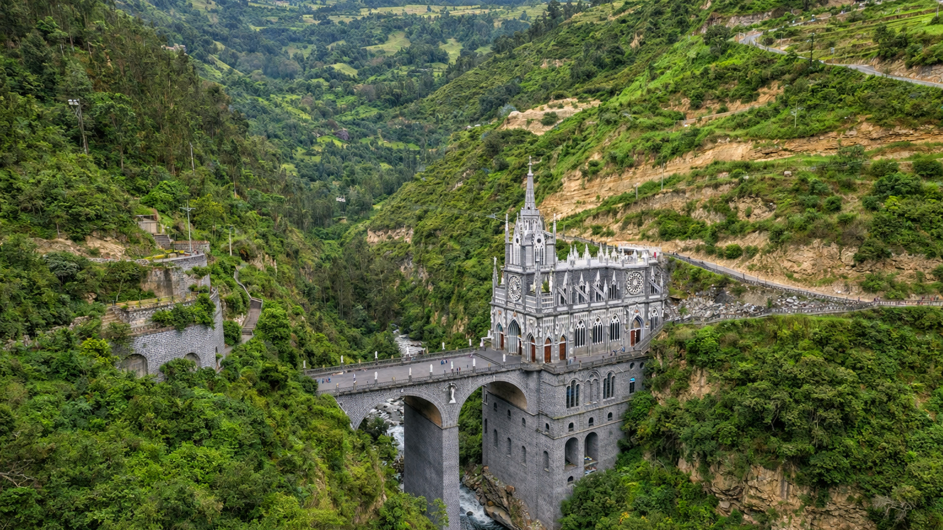 A church between mountains and river