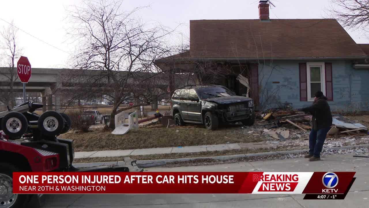 One person injured after car hits house in south Omaha