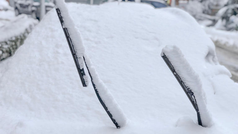 The risk with leaving your windshield wipers up in the snow