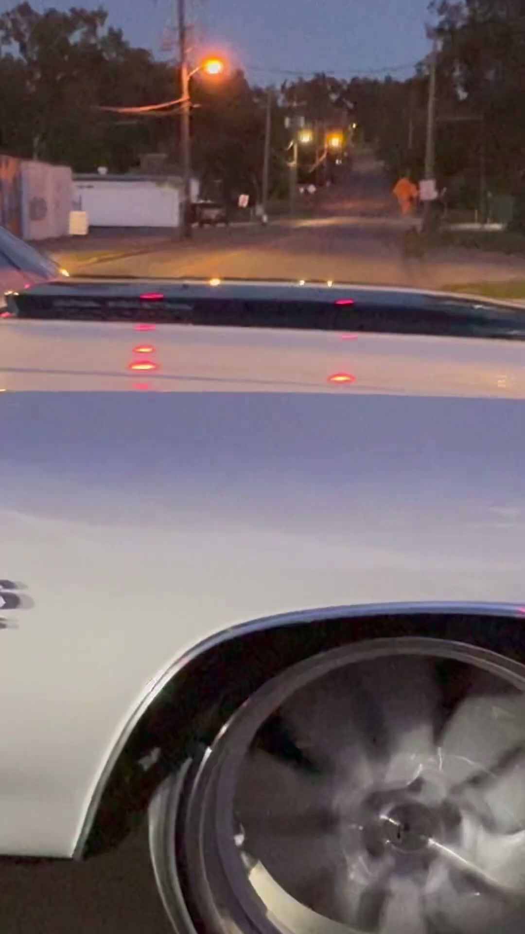 White Chevy Chevelle SS on 22’s riding