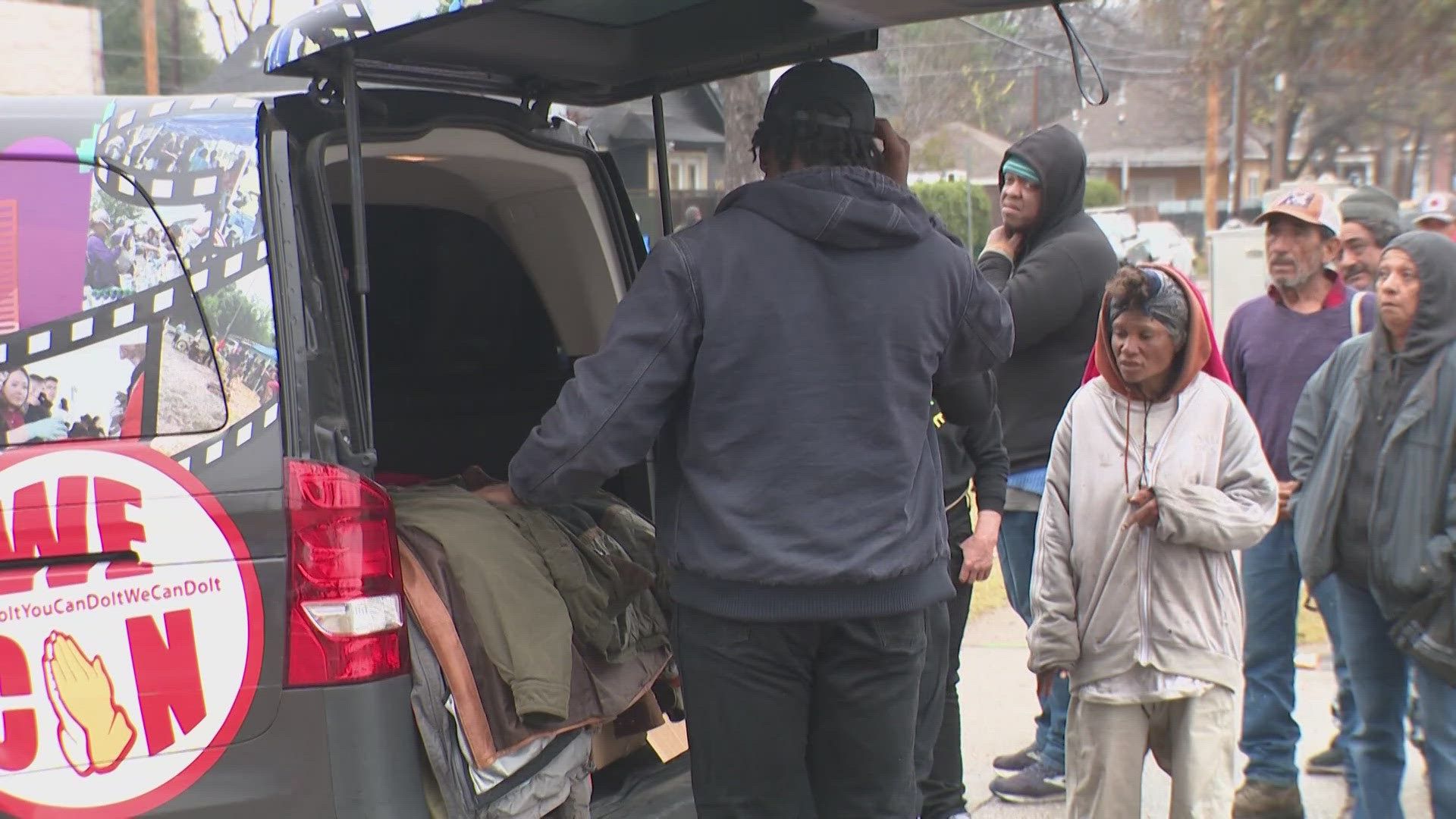 People experiencing homelessness in Austin receive cold weather kits