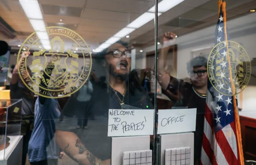 Activists barricade themselves inside Mayor Gloria’s office, demand ...