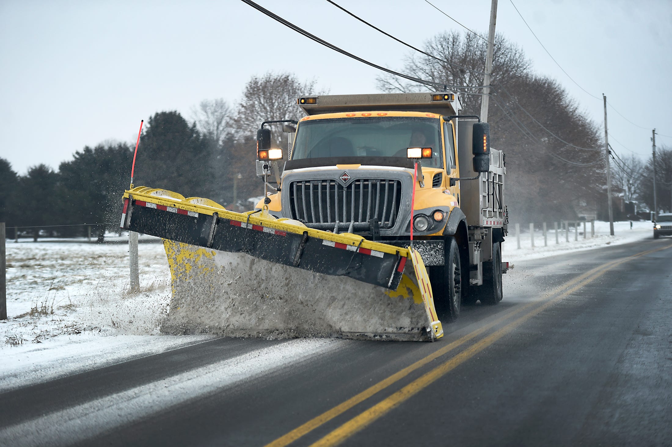 Snow, ice cover Illinois roads after winter storm. See road conditions map
