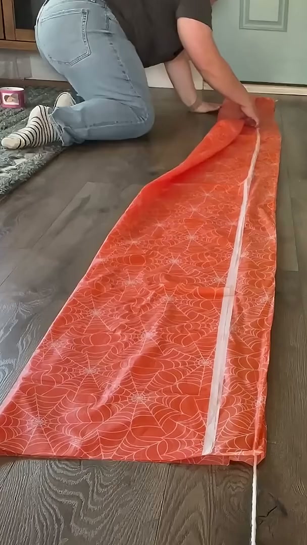 Buy a Dollar Store tablecloth for this genius dining room idea!