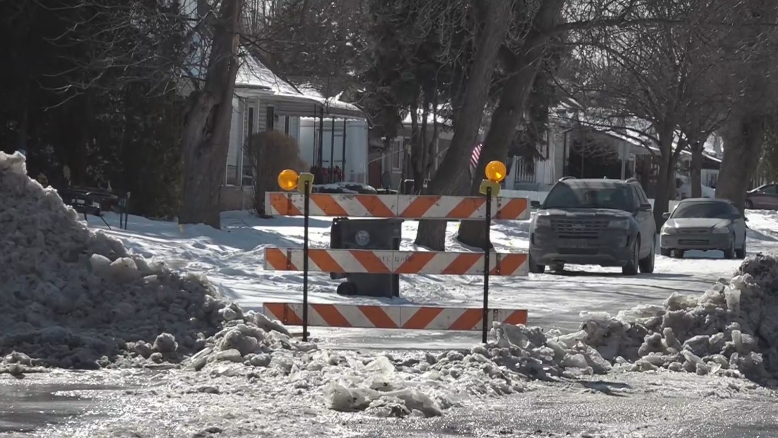 Water main break floods Melvindale streets, strands cars