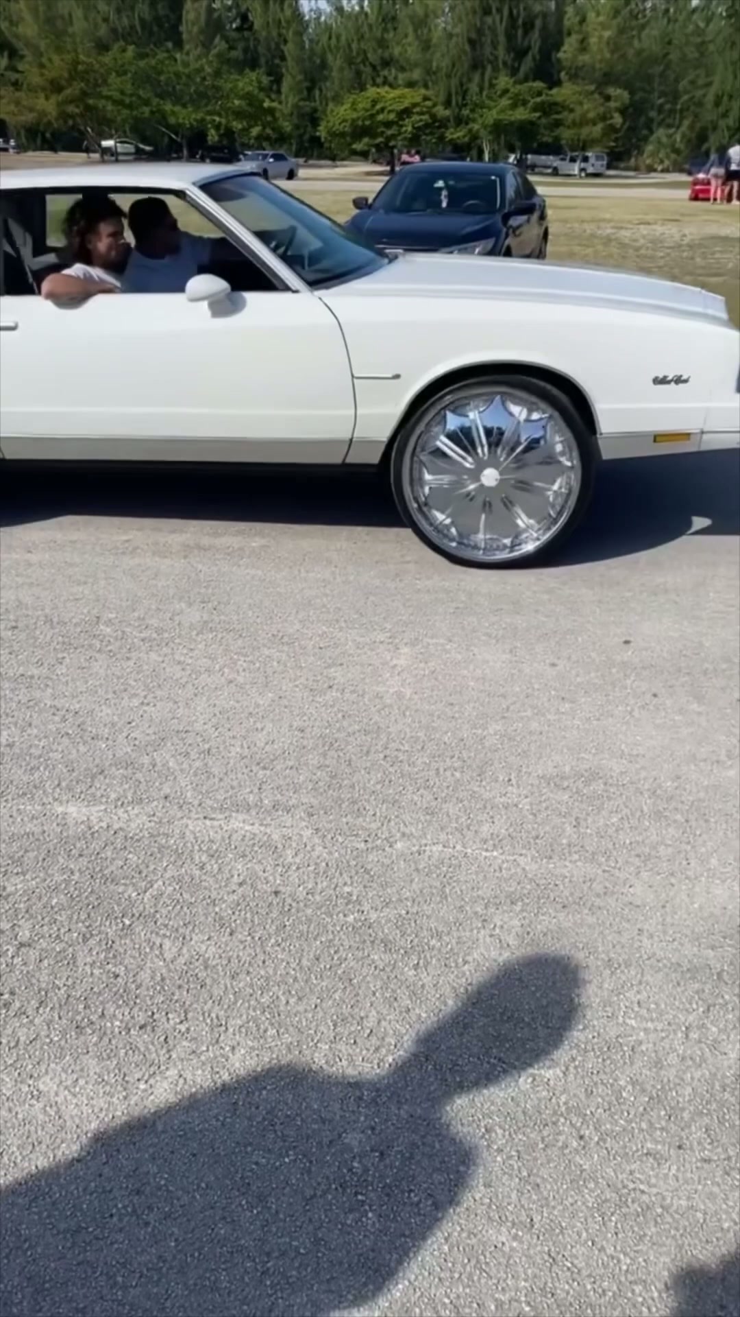 White Chevy Monte Carlo on 26” DUB floaters