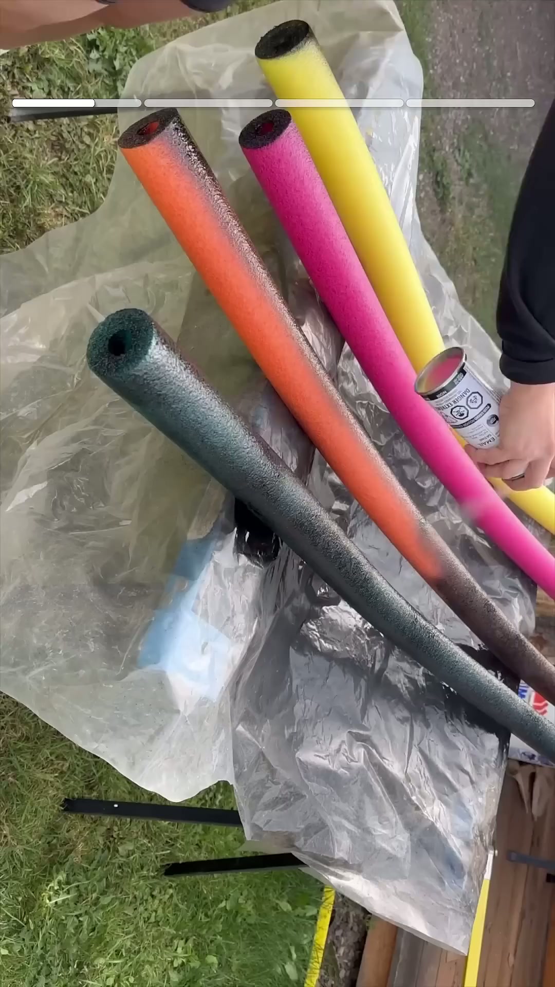 Spray paint some Dollar Tree pool noodles...👻🕷️🕸️