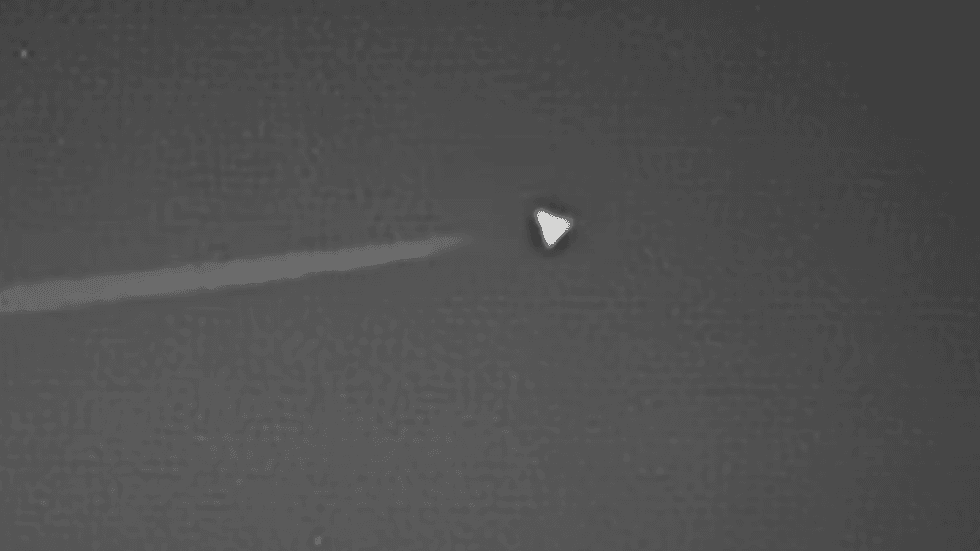 UFO mystery as 'Dorito' shaped craft spotted hovering above top-secret ...