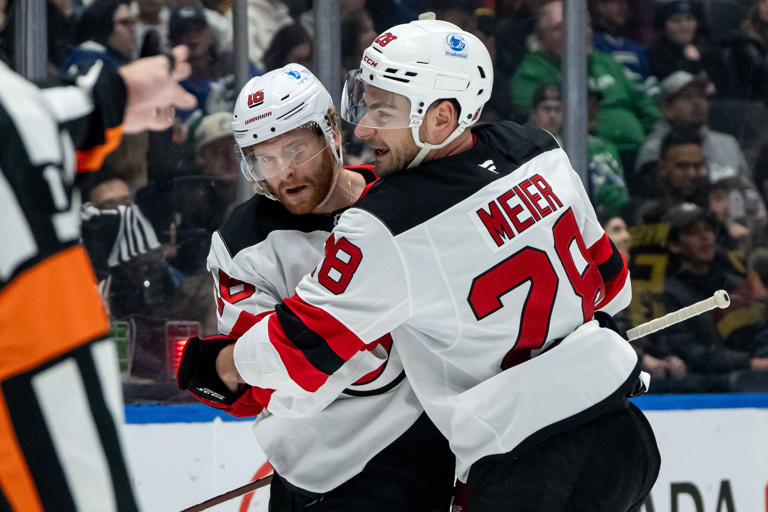 Cody Glass has 2 goals and an assist in Devils' 5-4 win over Canucks
