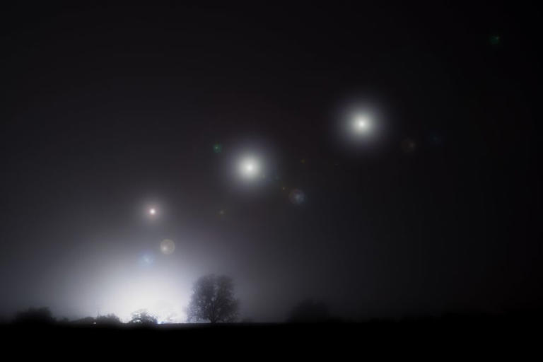 UFO mystery as 'Dorito' shaped craft spotted hovering above top-secret ...