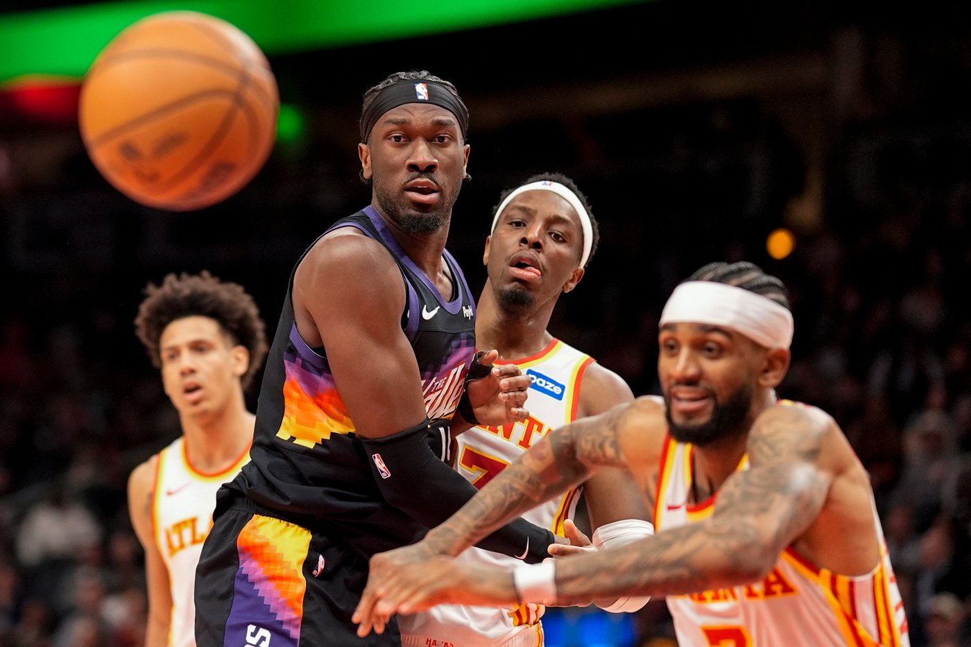 Hawks rally to beat Suns 110-103 after Phoenix loses Devin Booker to injury