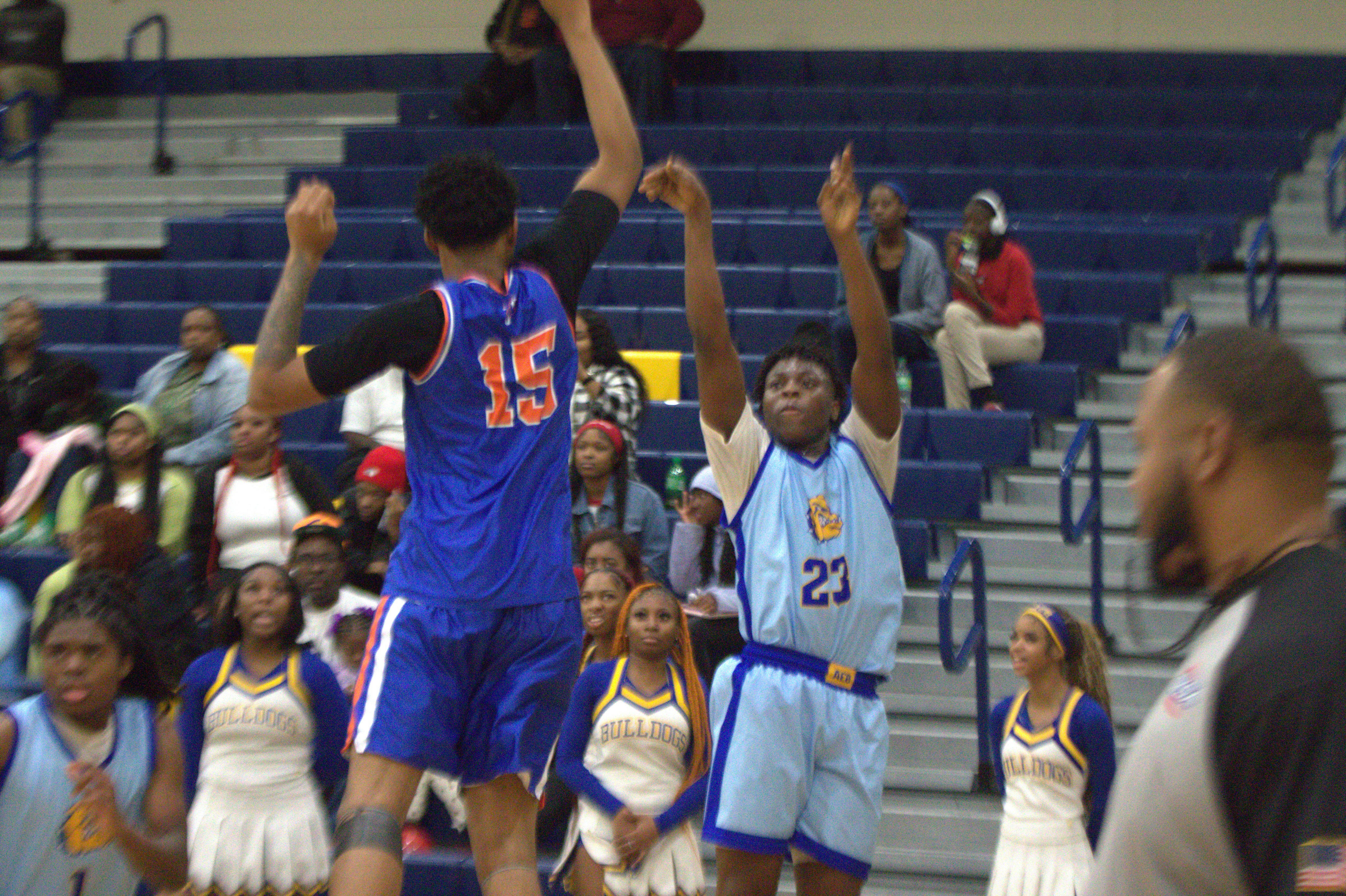 Johnson coach tears Achilles, watches Beach win on buzzer beater from ...