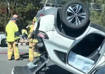 Car packed with eight teens hits Mercedes on freeway, flips it over