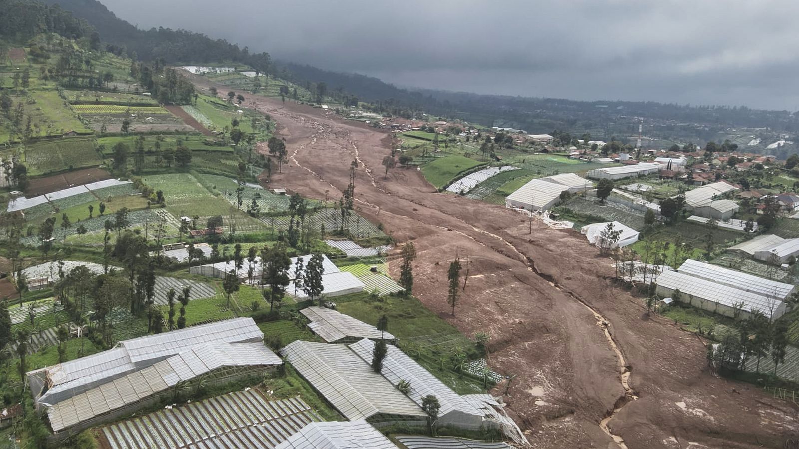 Dozens still missing after Indonesia landslide kills at least 11 people