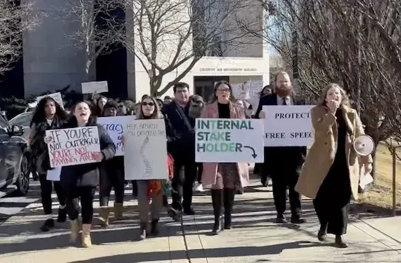 U Arkansas students protest revocation of job offer to pro-transgender ...