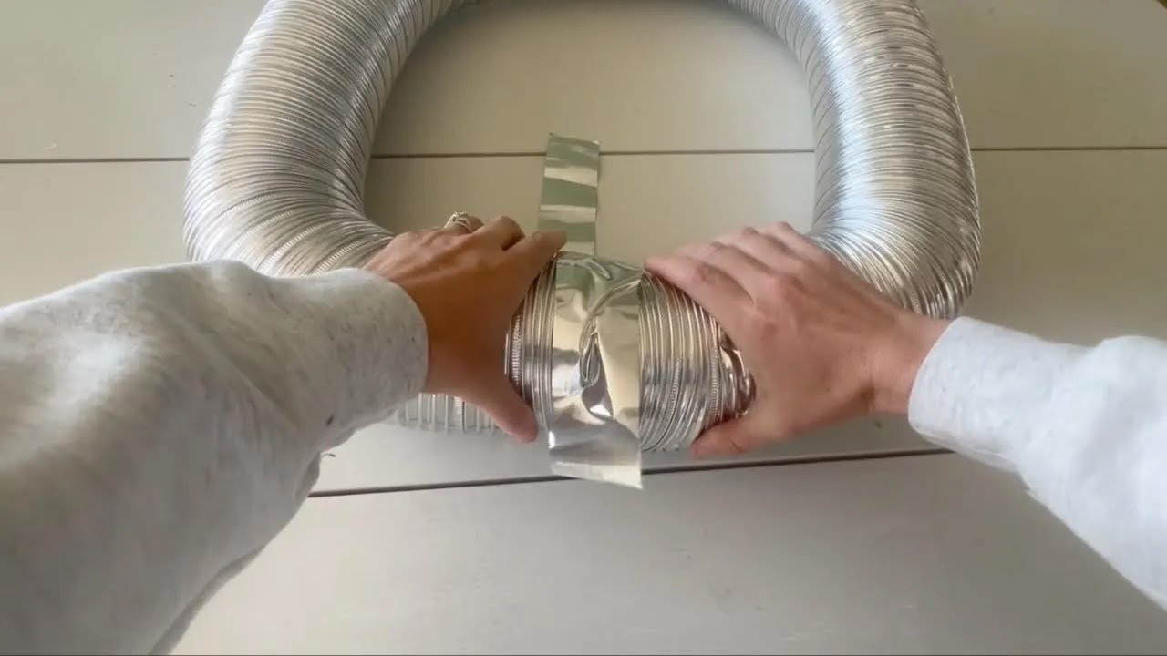 Tape up a dryer duct for this genius holiday lighting idea!