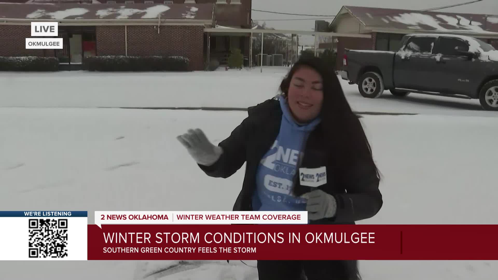 Isabel makes a snow angel
