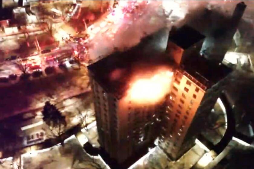 Gas explosion and fire on top floors of New York City apartment ...