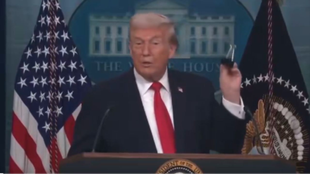 Donald Trump almost injures his finger with a paper clip live and is ...