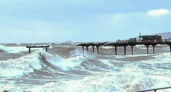Panic as historic UK pier 'washes away' in 'wild' storm