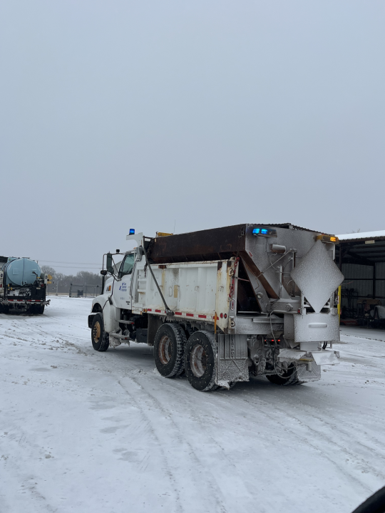 TxDOT Pharr crew clear snow-covered roads in Sherman