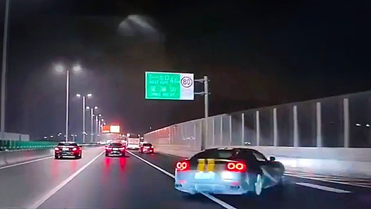 Ferrari skids into barrier after close call on icy road