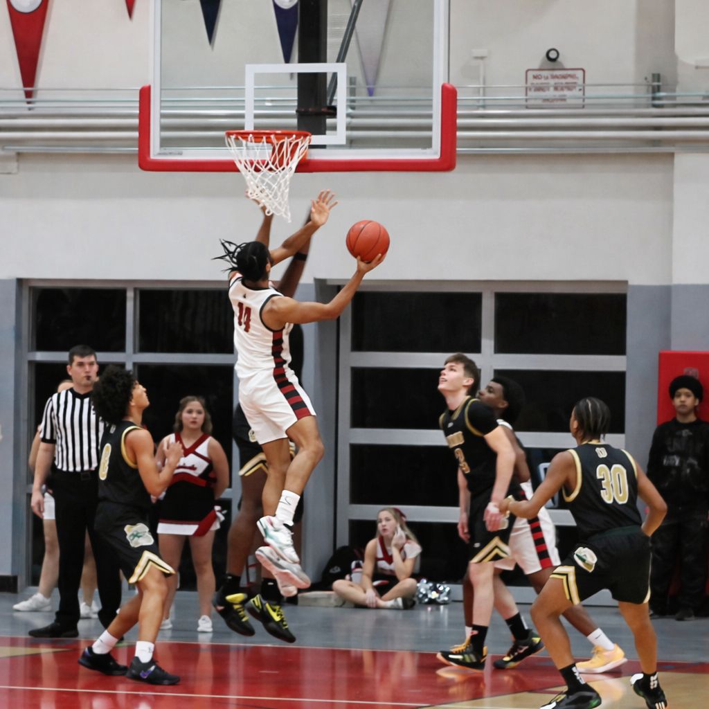 Case boys basketball overwhelms Horlick 101-54 with balanced scoring attack