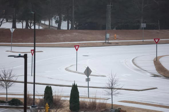 Icy roads in Mississippi lead to closures and travel warnings