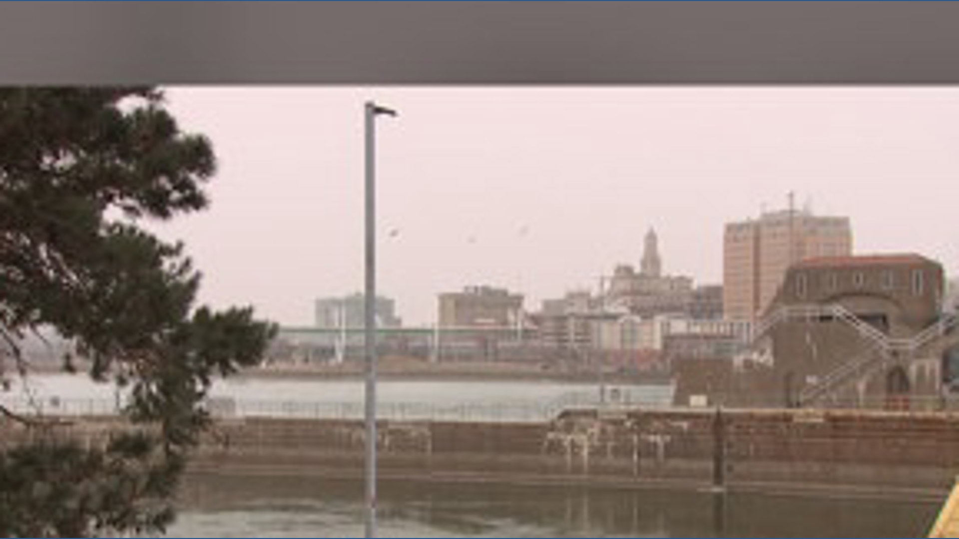 Bald eagles fly near the lock and dam