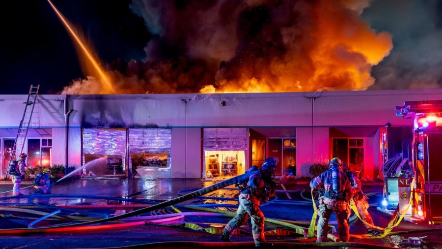 Firefighters battle two-alarm blaze at industrial warehouse in Argay ...