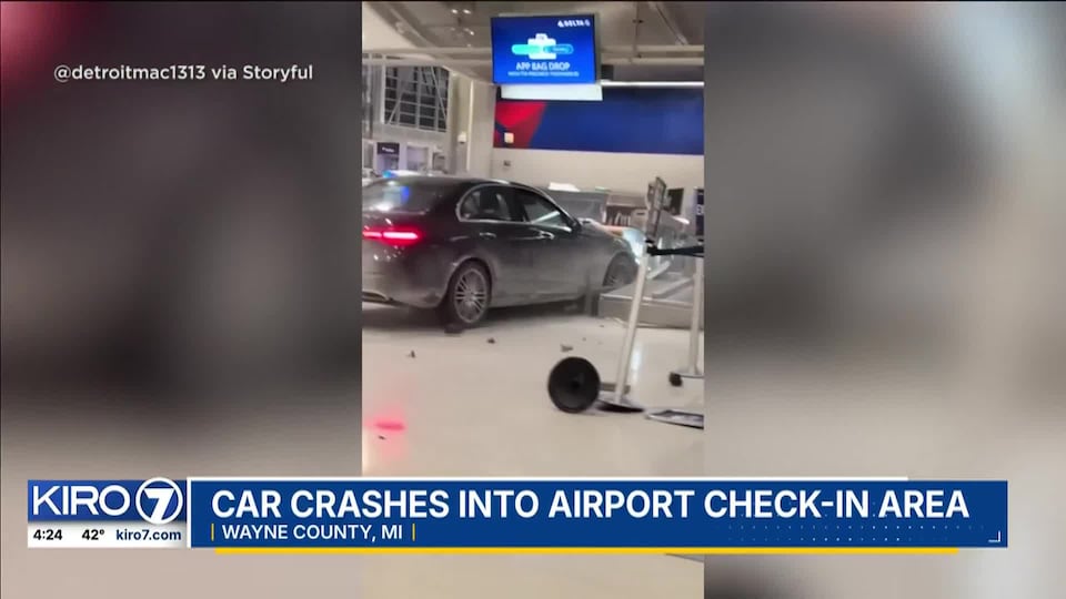 Video: Car crash into airport check-in area
