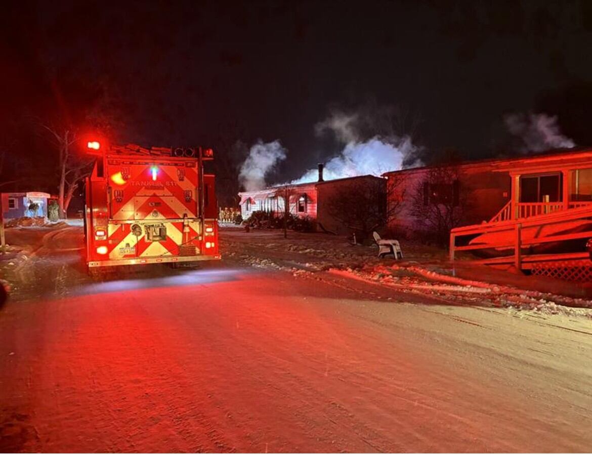 Crews battle Saturday night fire at mobile home in Holt