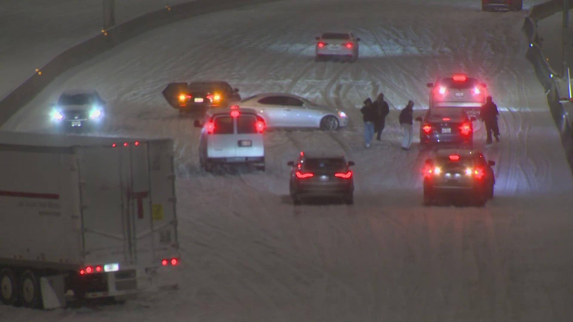 Multiple cars still stopped along eastbound Woodall Rodgers Freeway in ...